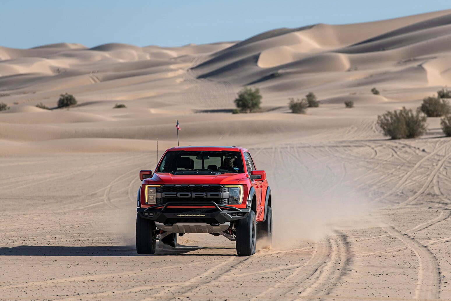 Hennessey Velociraptor 600 leaps dunes in the California desert as part ...